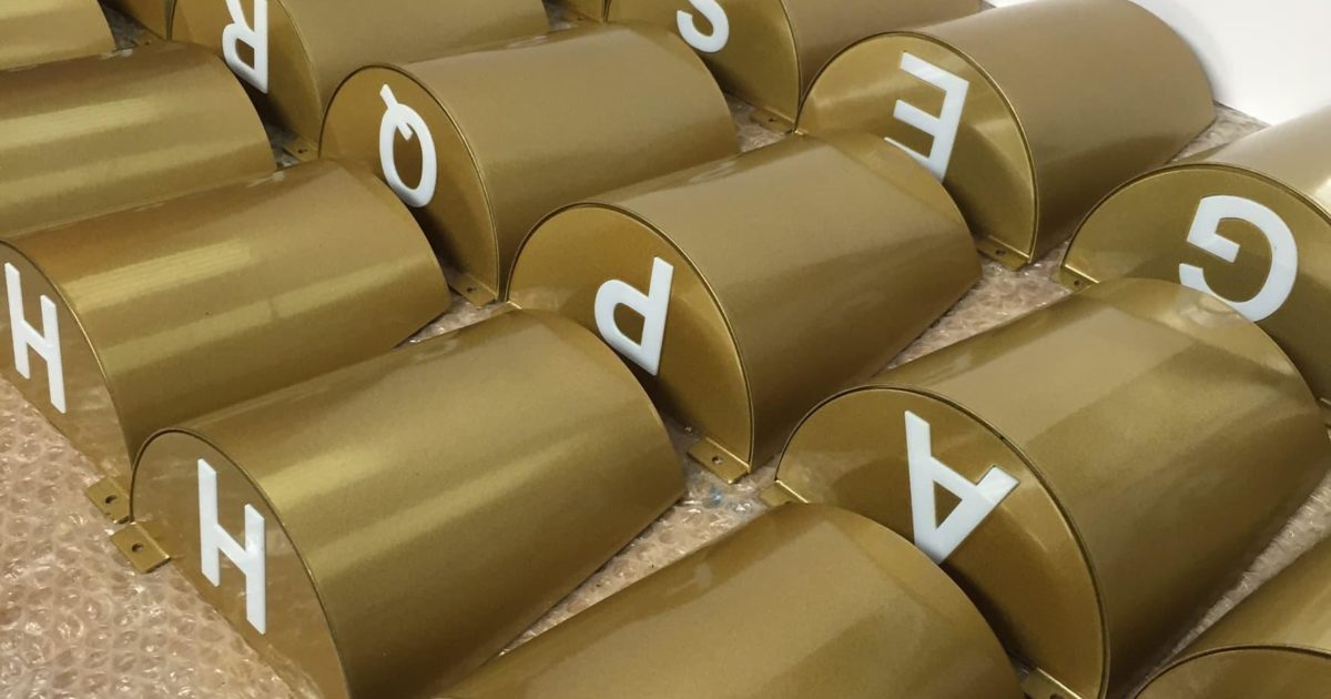 Illuminated auditorium seating row end letters - Robolights