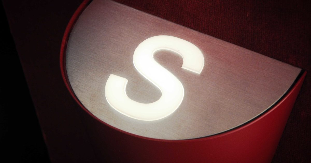 LED illuminated auditorium seat row letters. - Robolights